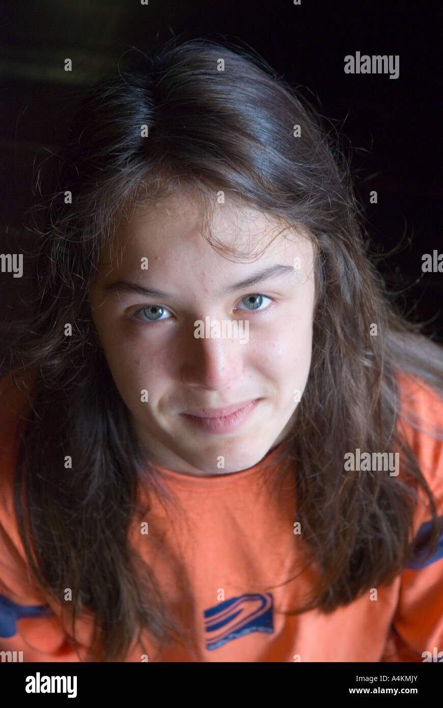 A fourteen year old boy with clean long hair Stock Photo - Alamy