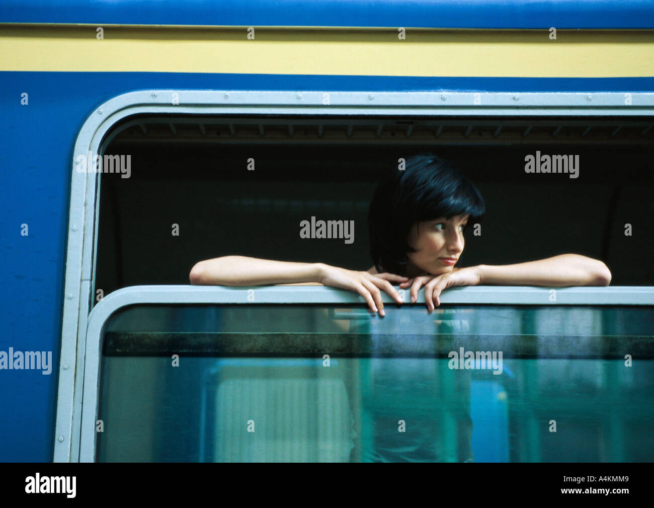 Train leaving woman hi-res stock photography and images - Alamy