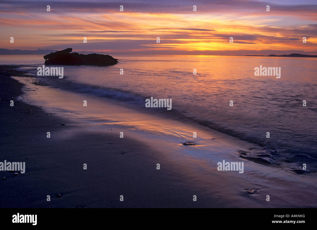 Sunset over West Beach in Deception Pass State Park, Washington, USA ...
