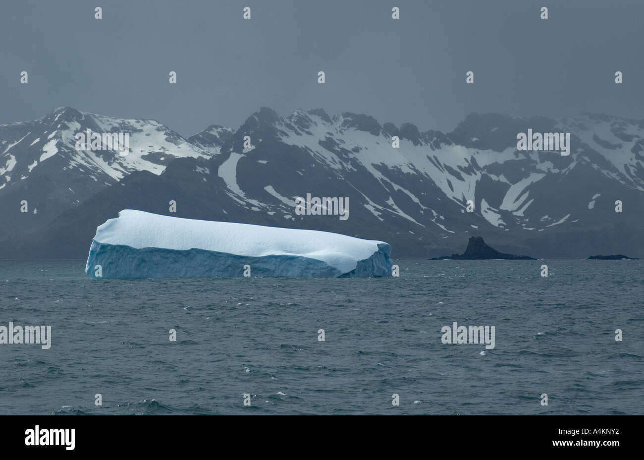 Iceberg and Mountains off South Georgia Coast Antarctica Stock Photo ...