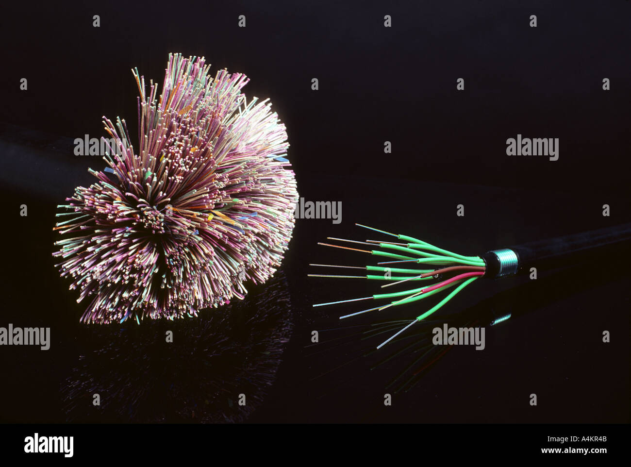 Fiber optic cable at right carries five times as many calls as old ...