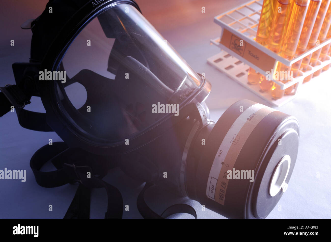 a gas mask and toxic chemicals in test tubes Stock Photo - Alamy