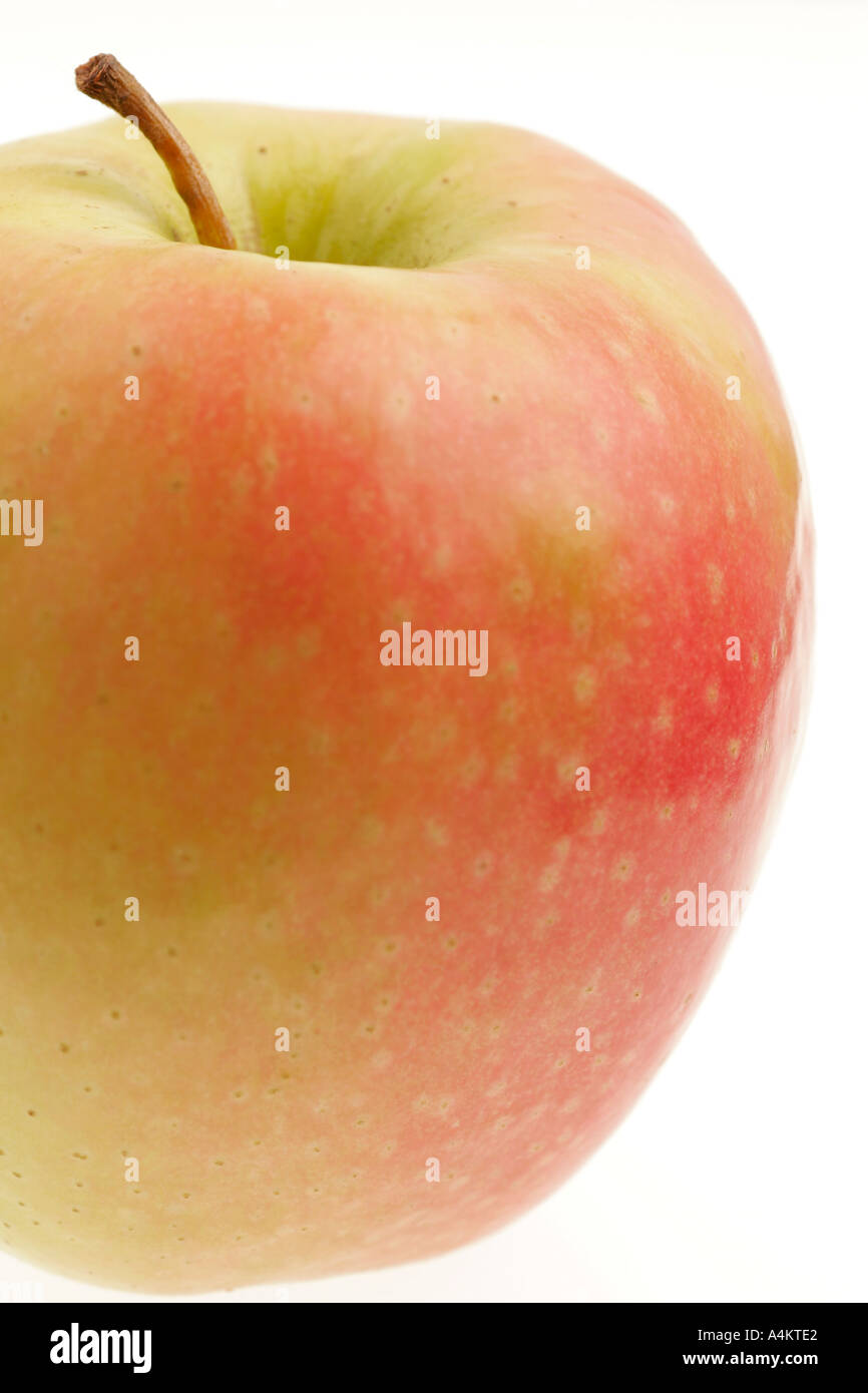 Single Pink Lady apple on white background Stock Photo - Alamy