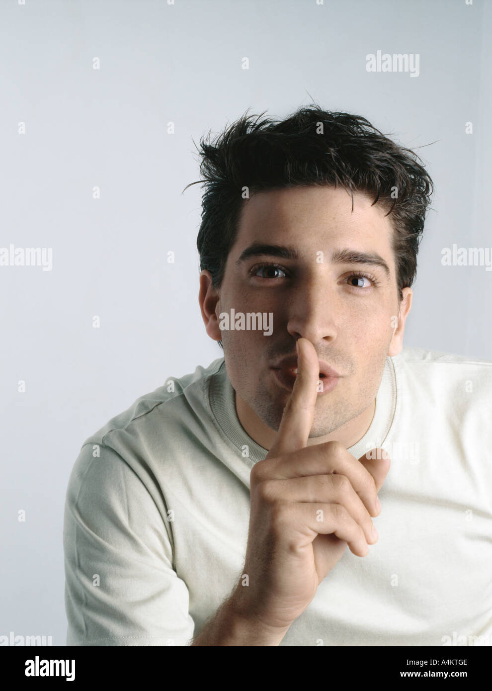 Man finger over lip hi-res stock photography and images - Alamy