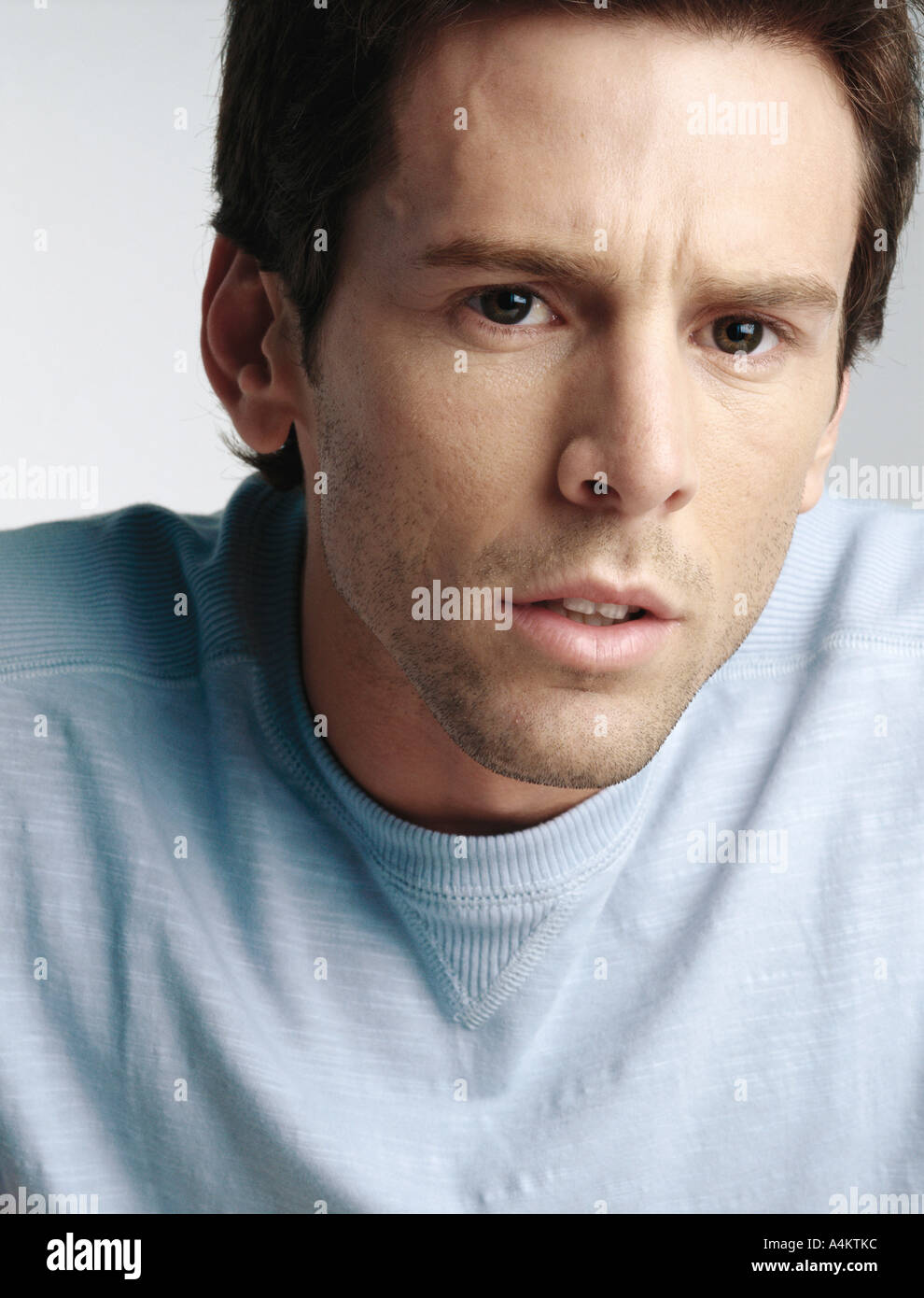 Furrowing brow hi-res stock photography and images - Alamy