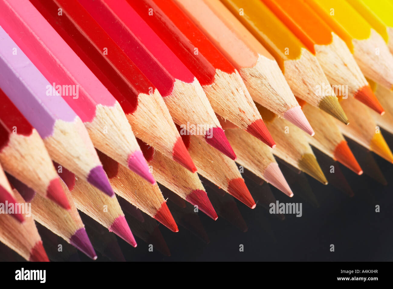 Colored Crayons on a mirror Stock Photo - Alamy