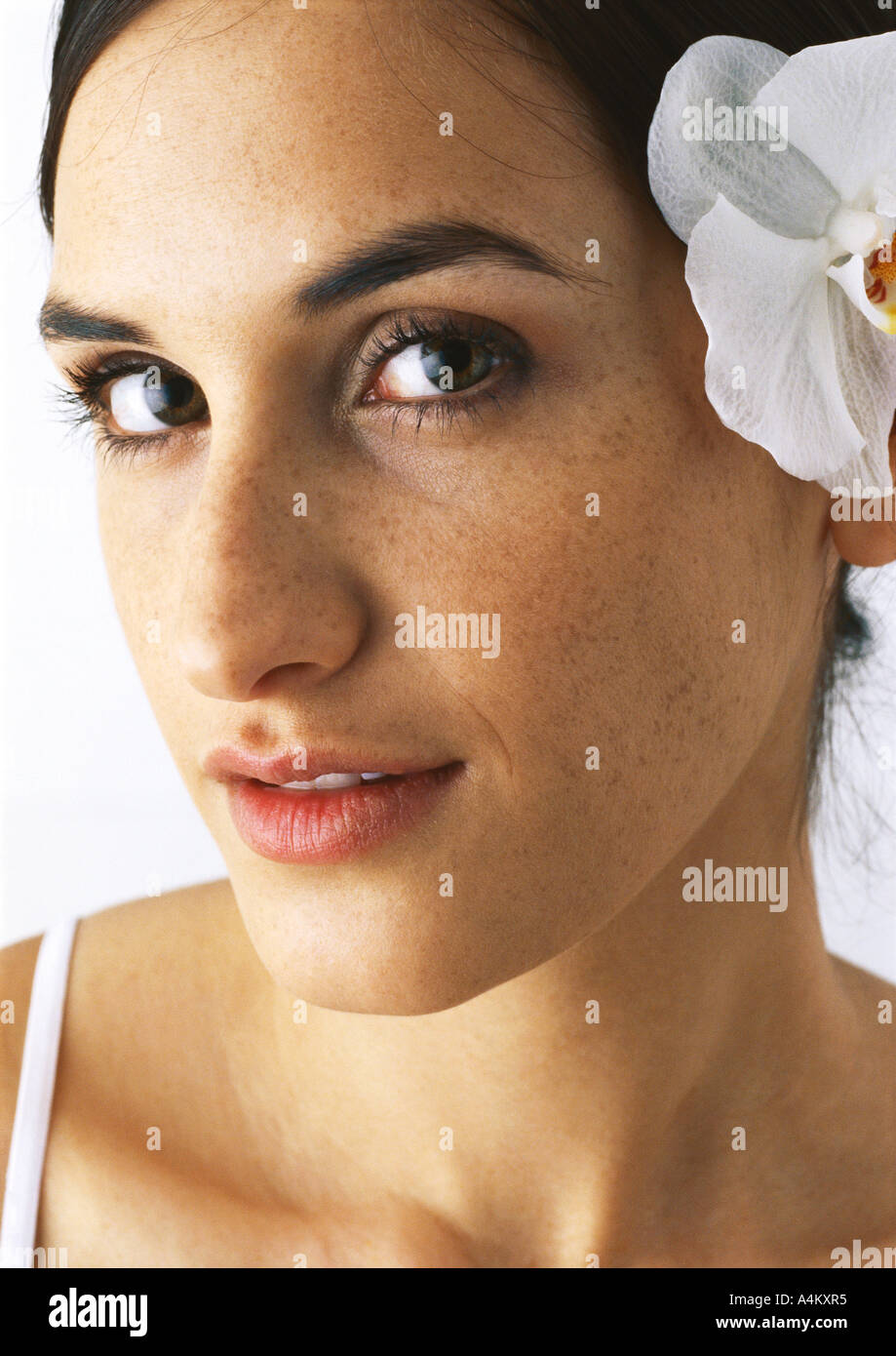 Wearing flower behind ear hi-res stock photography and images - Alamy