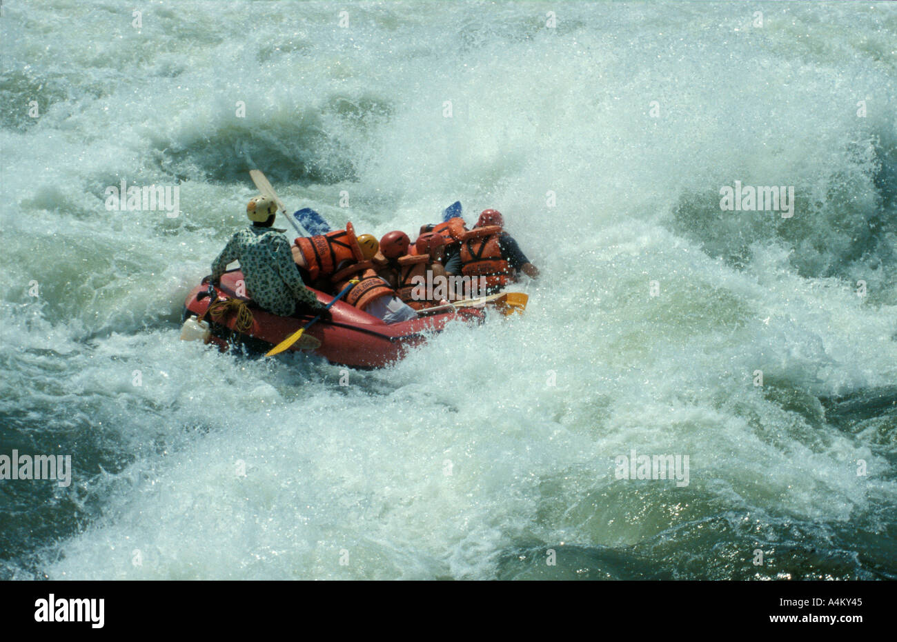 A raft boat going into the Bujagali Rapid at Jinja Uganda Stock Photo ...