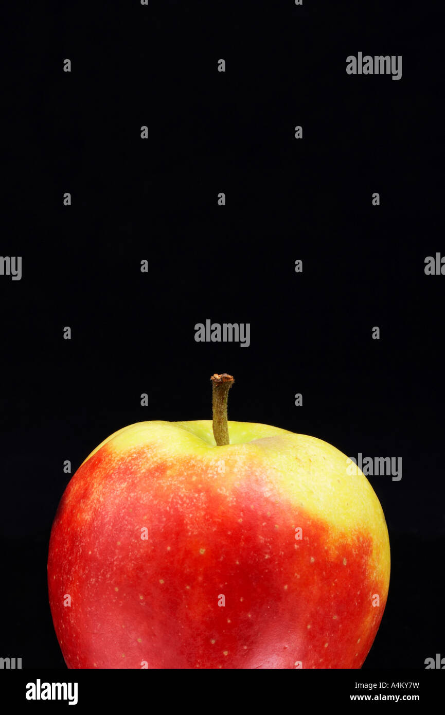 Red apple on black background Stock Photo - Alamy
