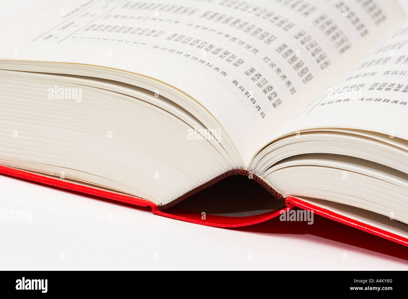 open mathematics book on white background Stock Photo - Alamy