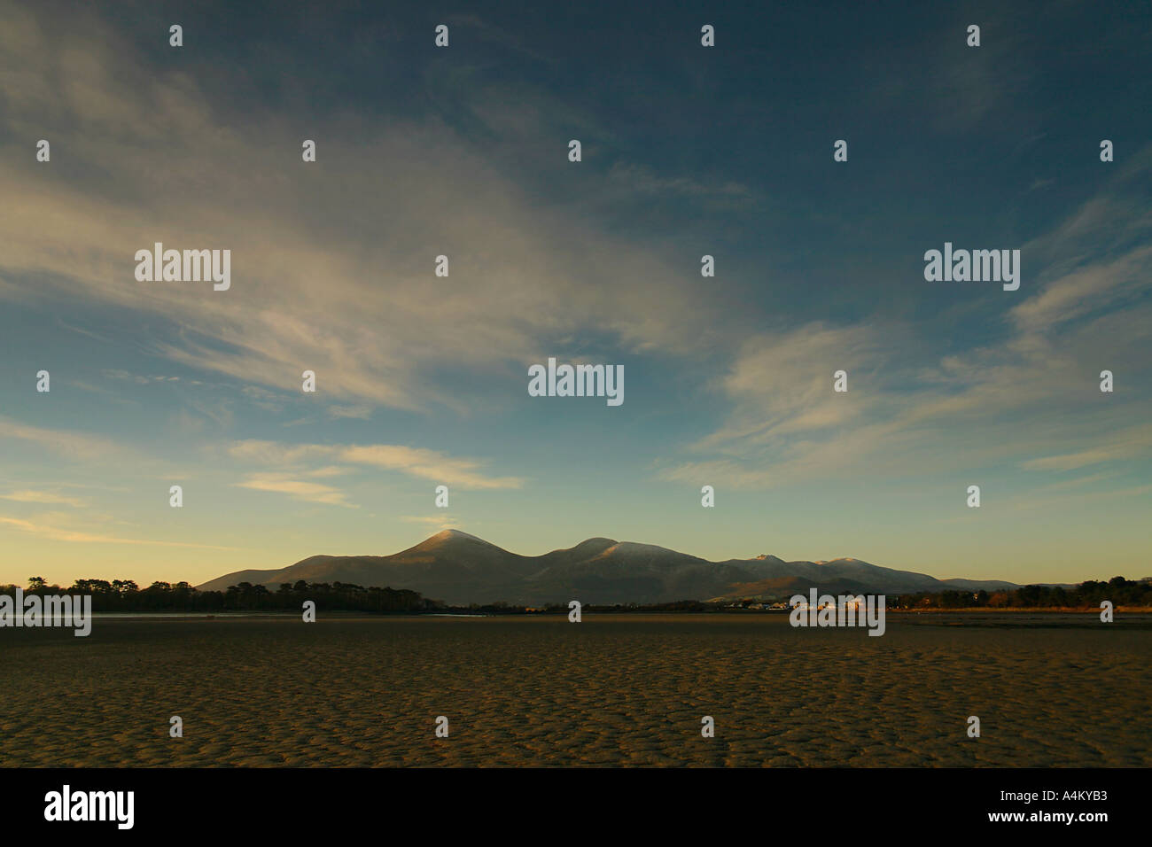 Winter sky over the Mourne Mountains from Dundrum County Down Northern ...