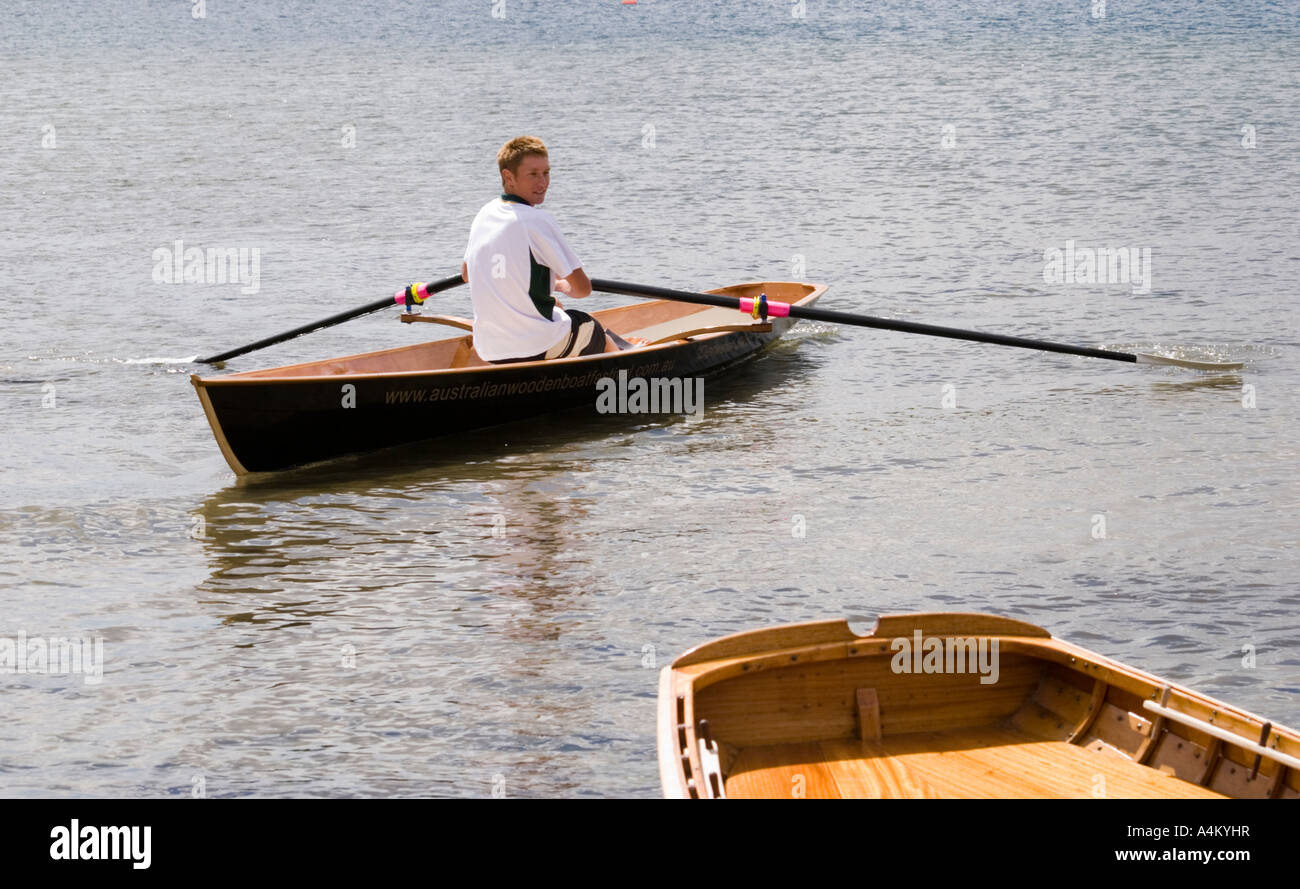 Rowing in a sleek modern designed rowing skiff Stock Photo - Alamy
