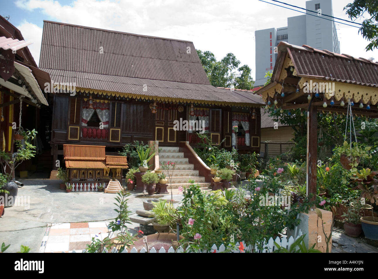 Typical Malay house in an inner city kampong Kampung Morten in Malacca ...