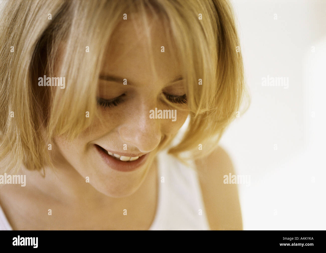 Eyes turned down hi-res stock photography and images - Alamy