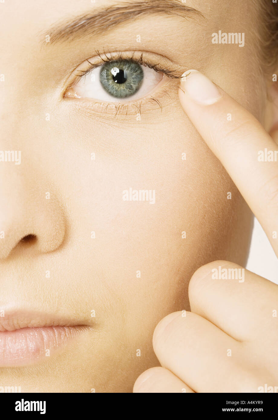 Eye close up finger pointing hi-res stock photography and images - Alamy
