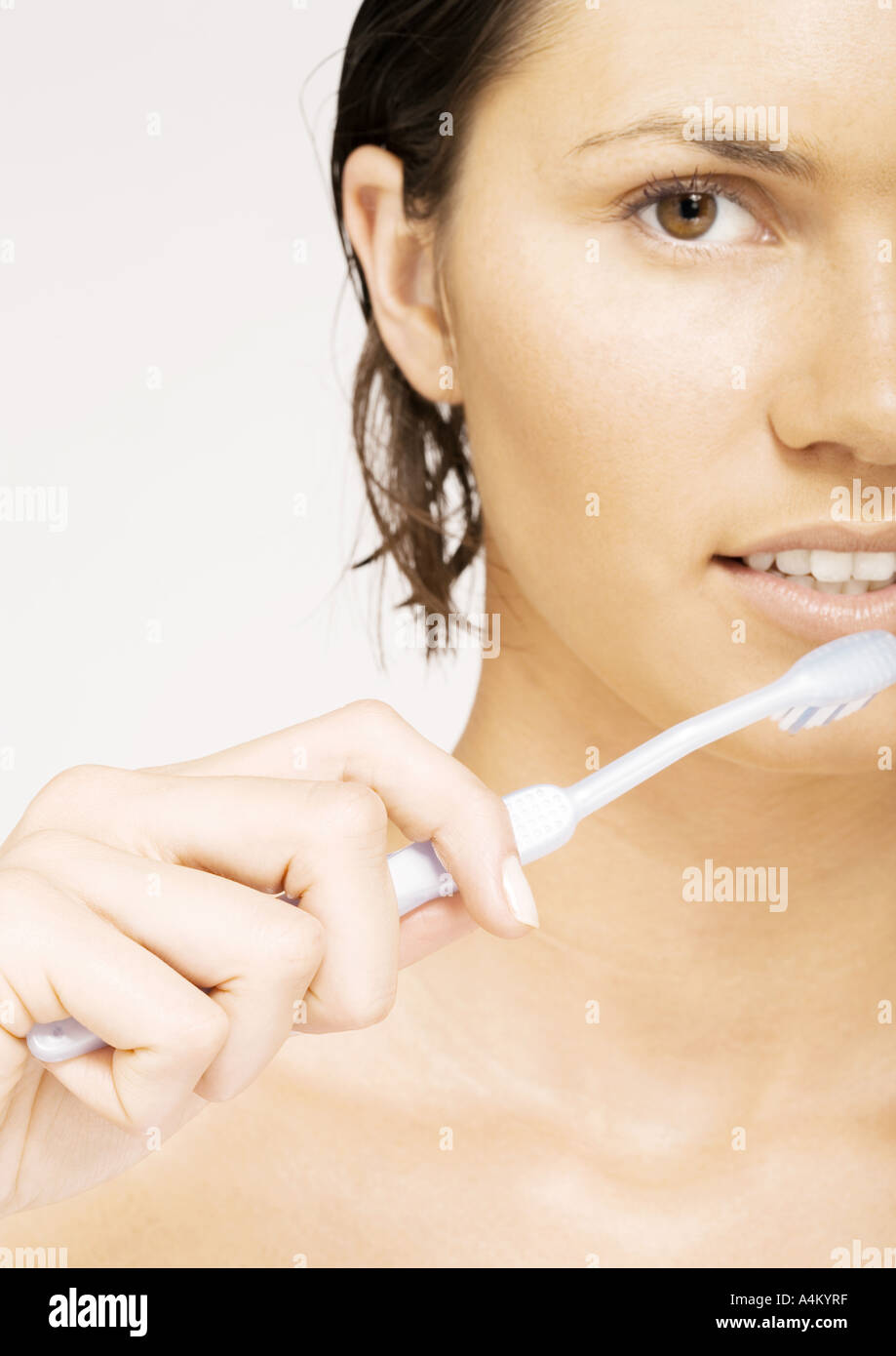 Brushing hair from face hi-res stock photography and images - Alamy