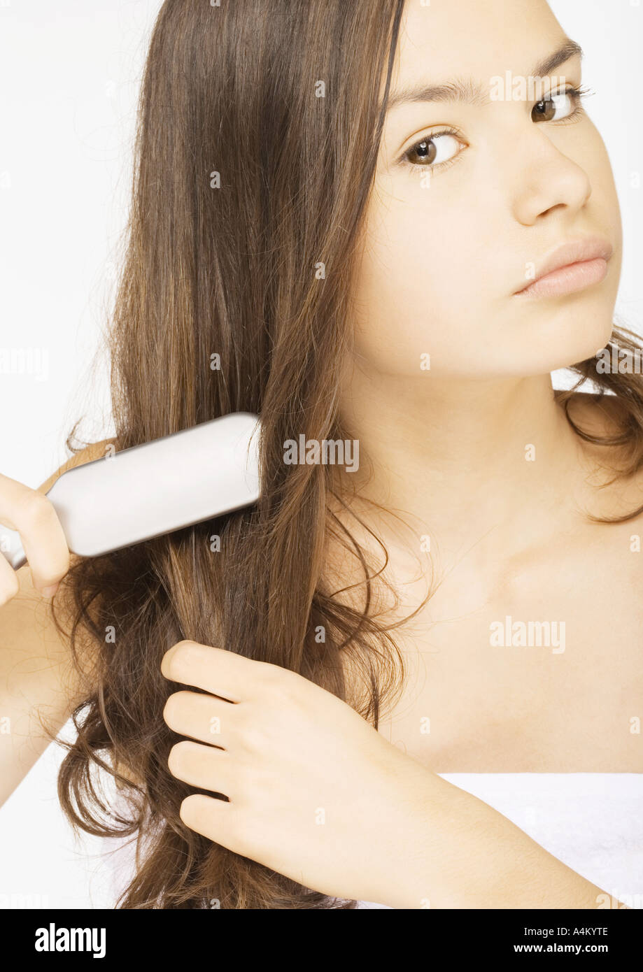 Brushing hair out of face hi-res stock photography and images - Alamy