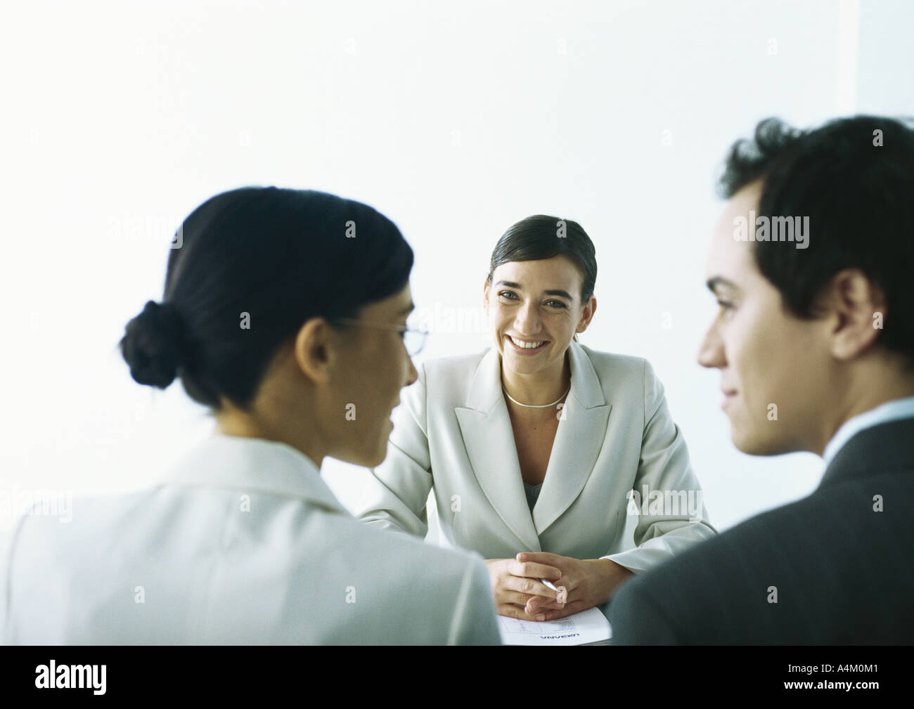 Couple sitting across from each other hi-res stock photography and ...
