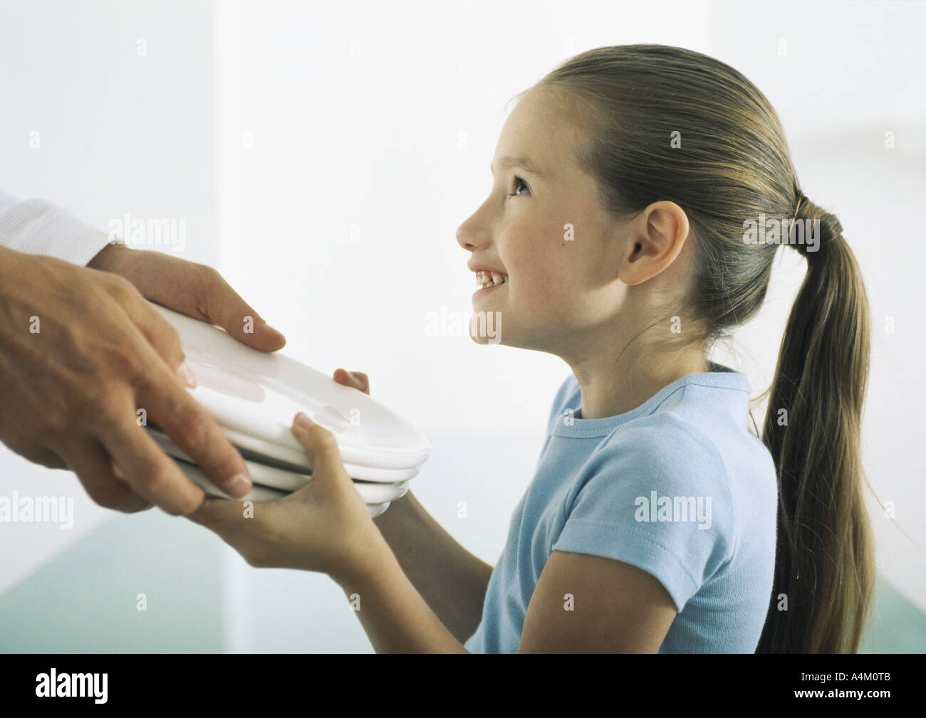 Child Setting Table Plates High Resolution Stock Photography and Images ...