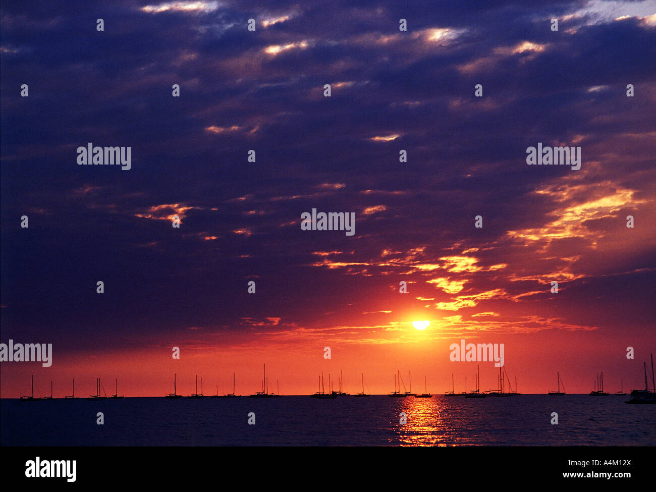 The setting sun over the Timor Sea Darwin in the Northern Territories ...