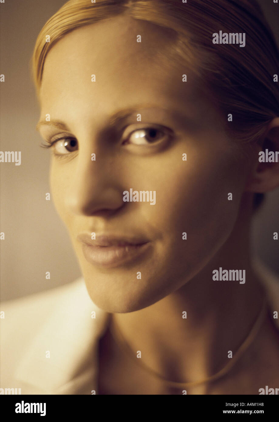 Sophisticated young woman looking back hi-res stock photography and ...