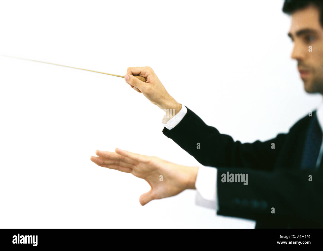 Orchestra conductor, side view Stock Photo - Alamy