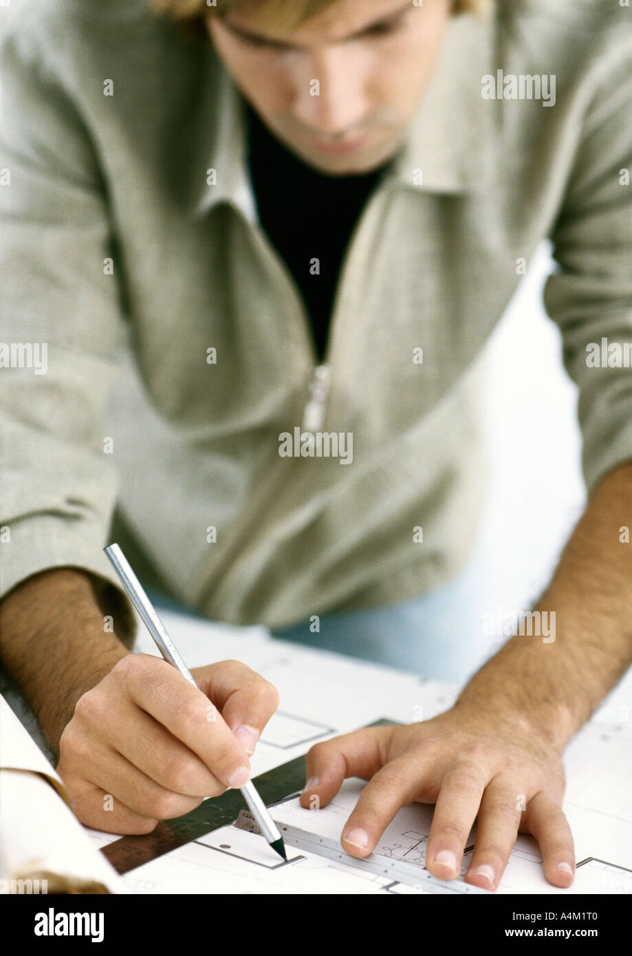 Man draws technical drawings hi-res stock photography and images - Alamy