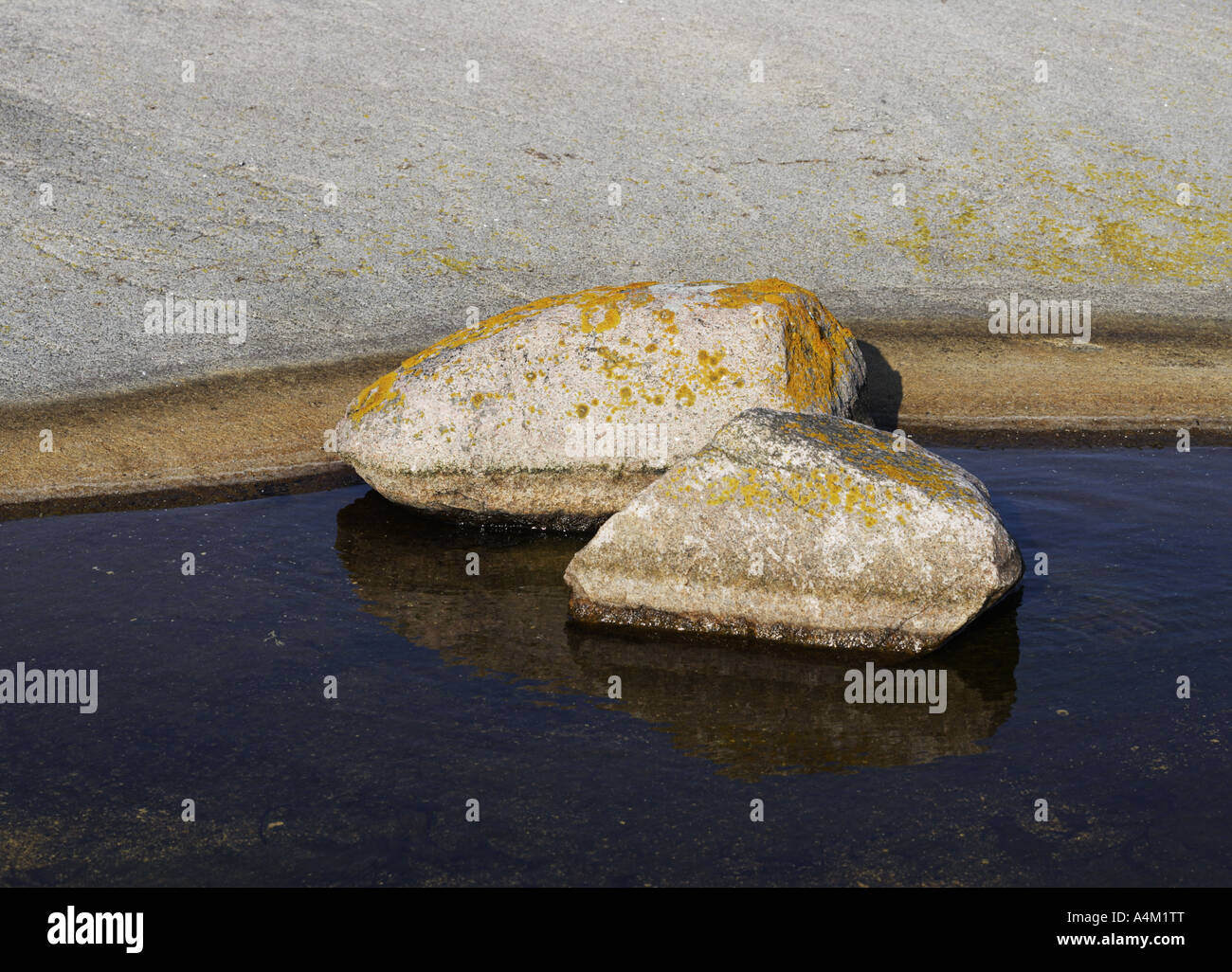 Stones in pool at granite flat rock Stock Photo - Alamy