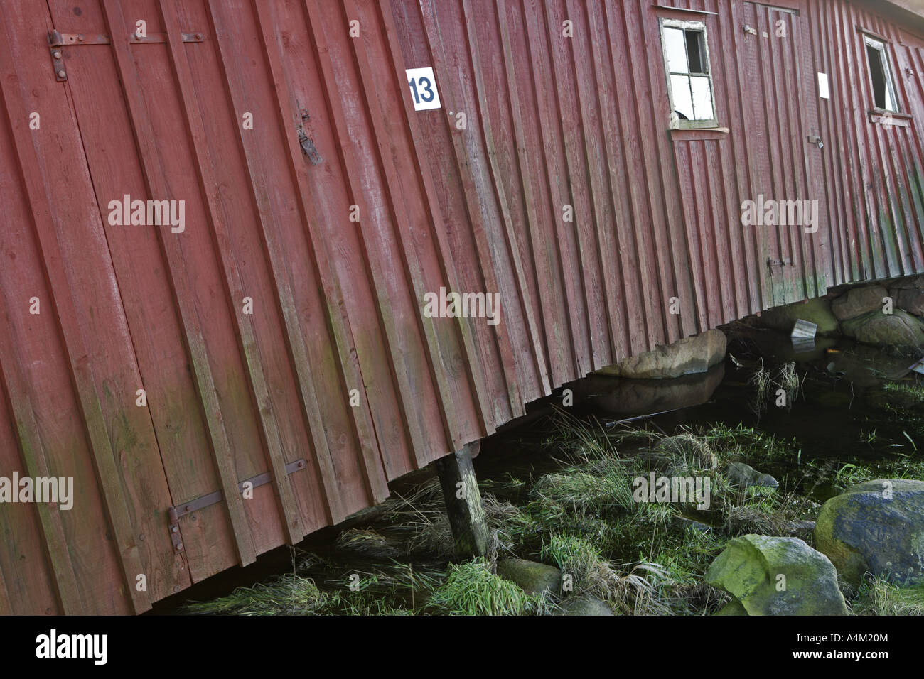 Dilapidated wooden boathouse hi-res stock photography and images - Alamy