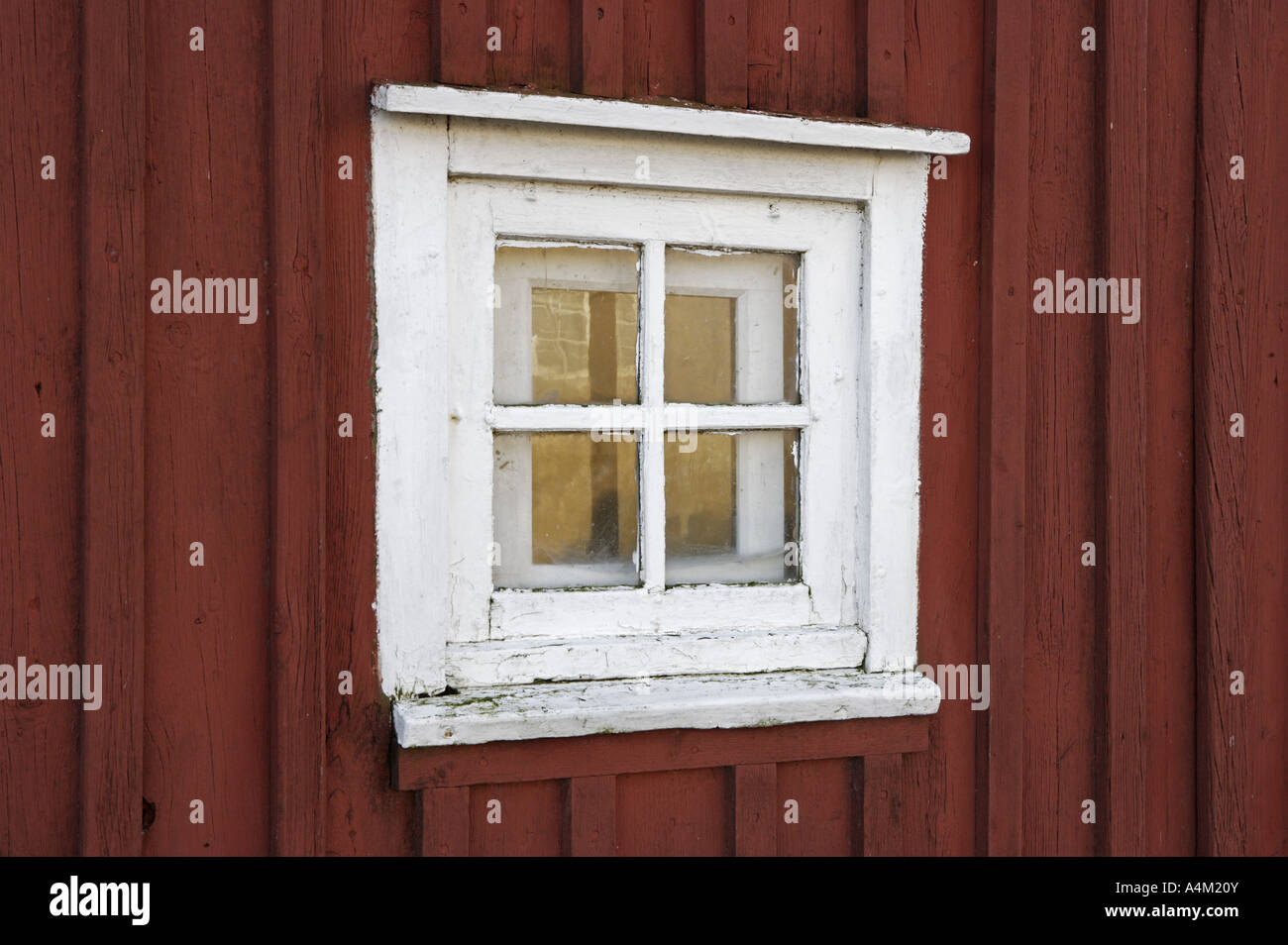 White paned window in red wooden cottage Stock Photo - Alamy