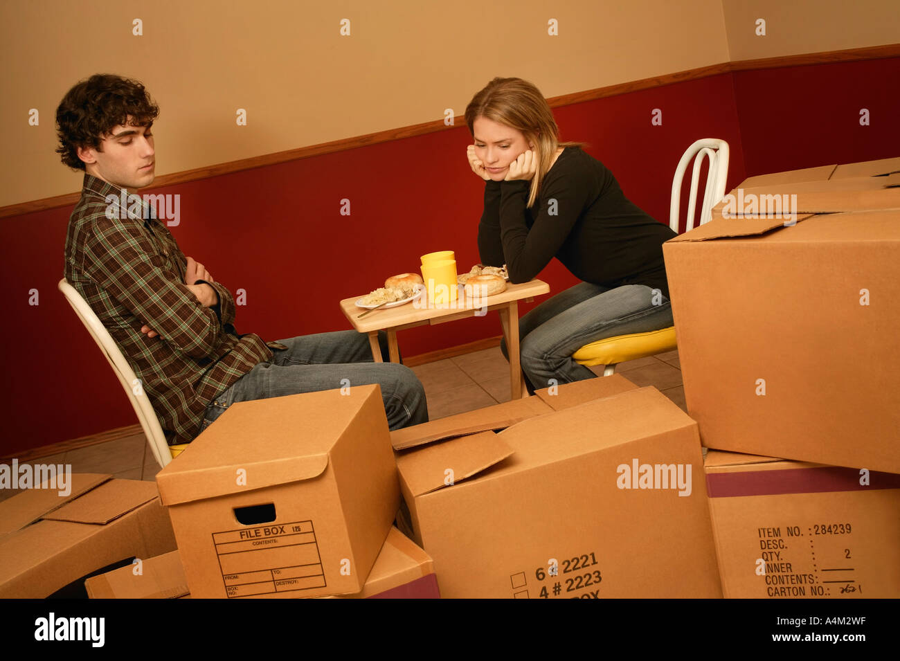 Moving house woman overwhelmed hi-res stock photography and images - Alamy