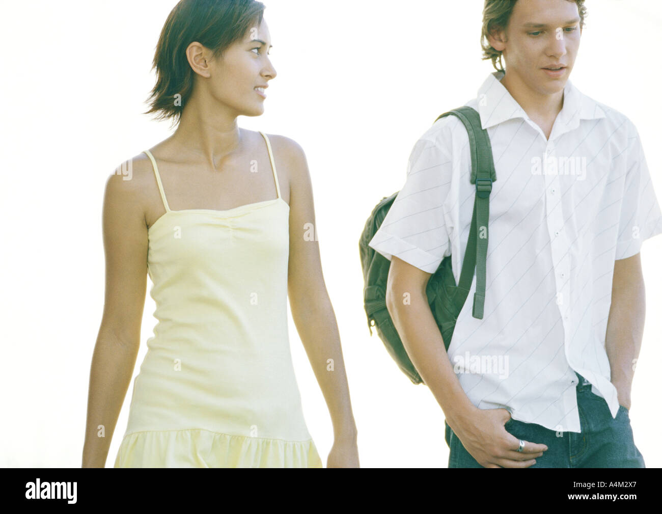 Two students walking side by side Stock Photo - Alamy