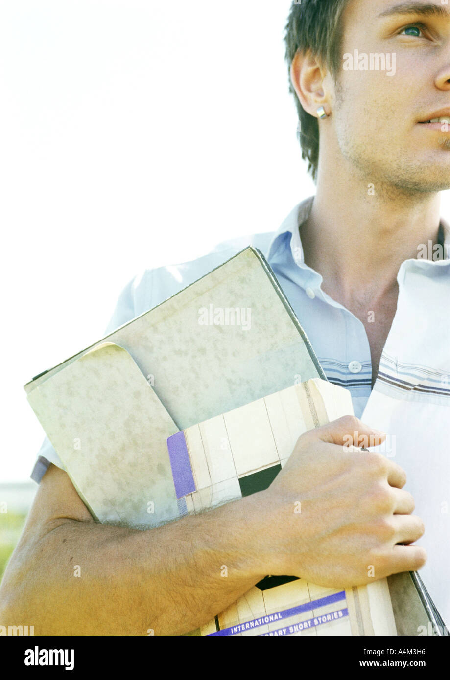 Student carrying folders outdoors hi-res stock photography and images ...