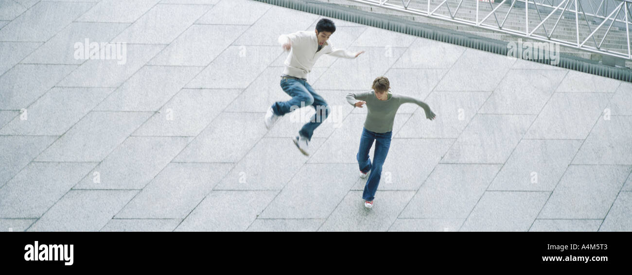 Man running away jeans hi-res stock photography and images - Alamy