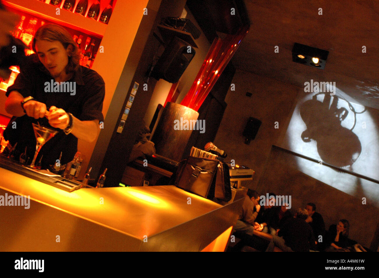 Barman preparing cocktails in a club in the Navigli area in Milan Italy ...