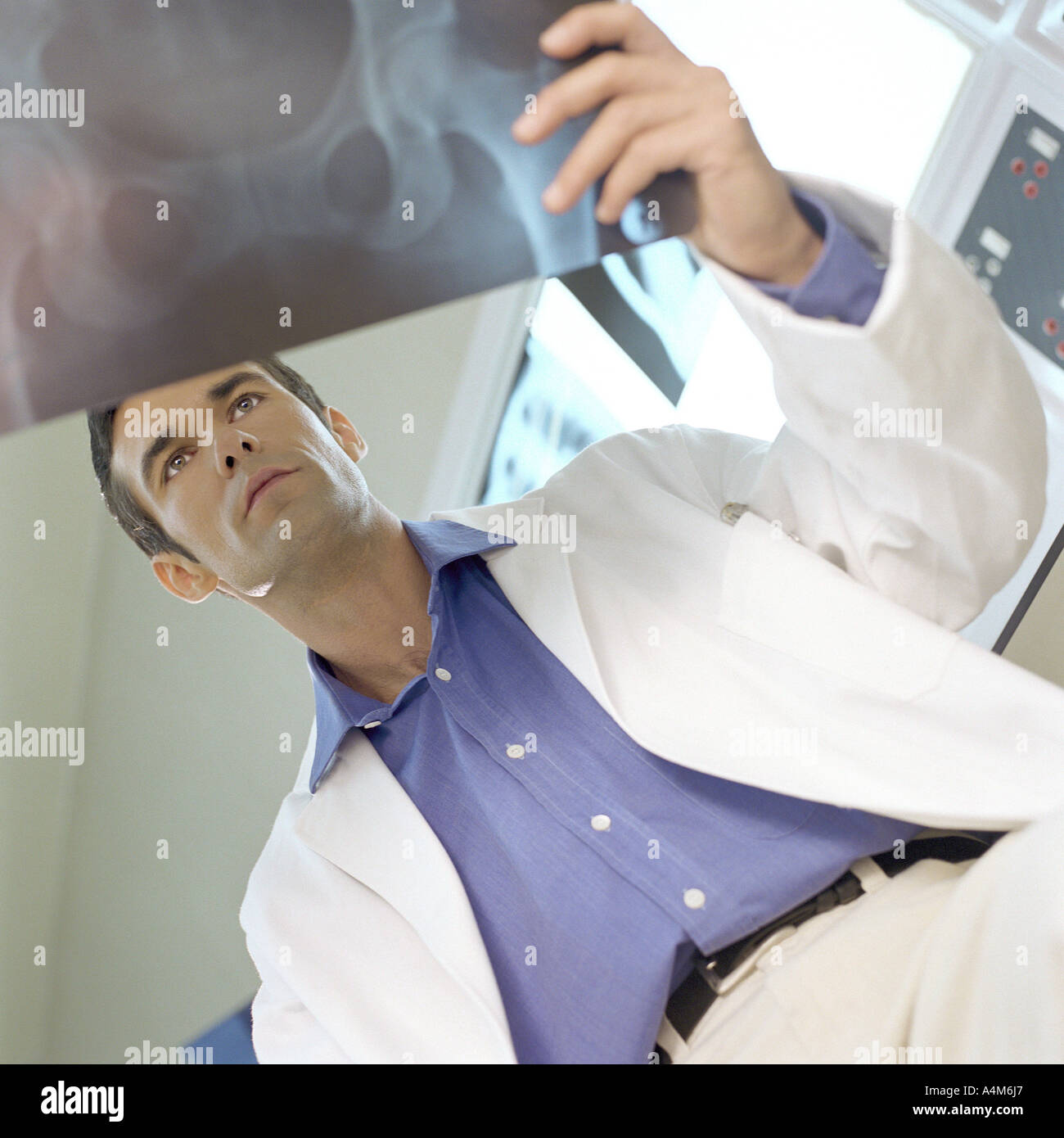 Male doctor in x-ray lab Stock Photo - Alamy