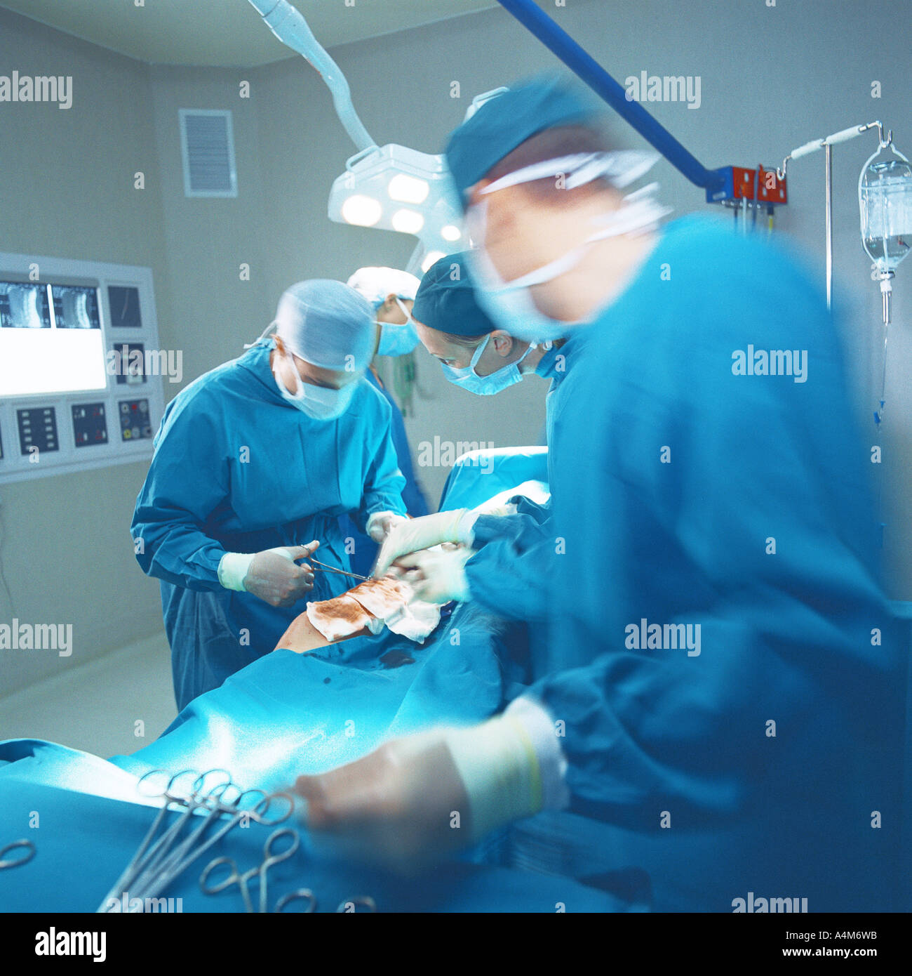 Doctors performing operation Stock Photo - Alamy