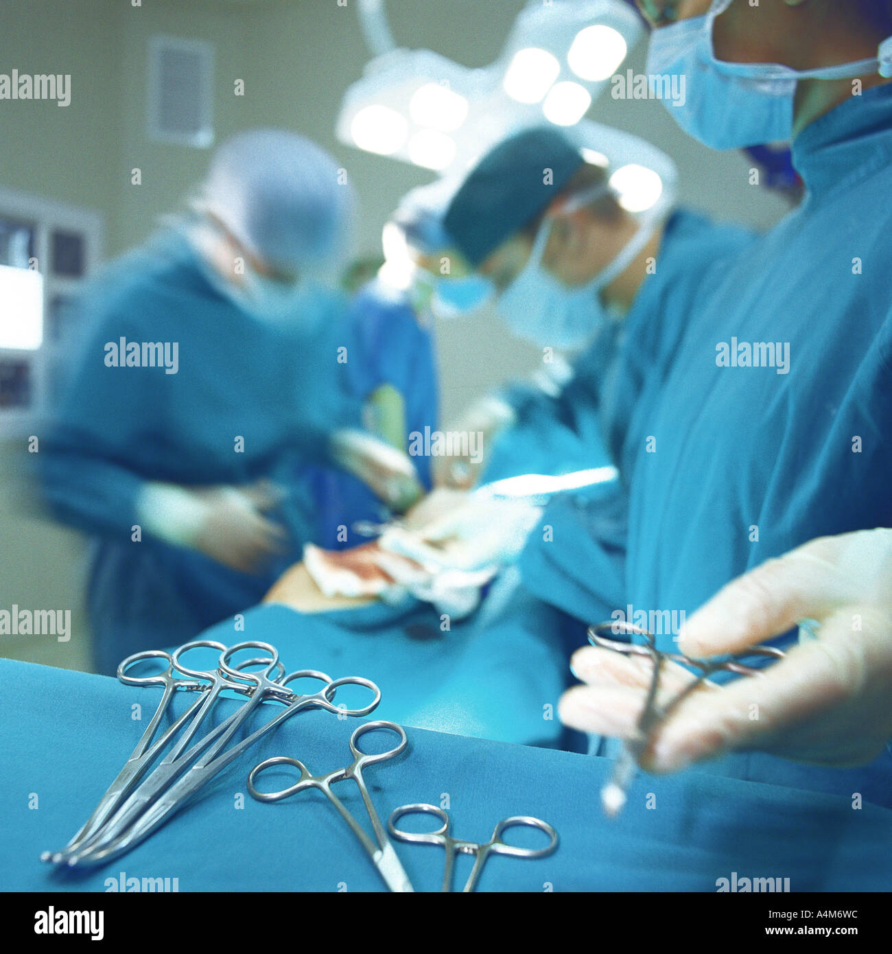 Doctors performing operation Stock Photo - Alamy