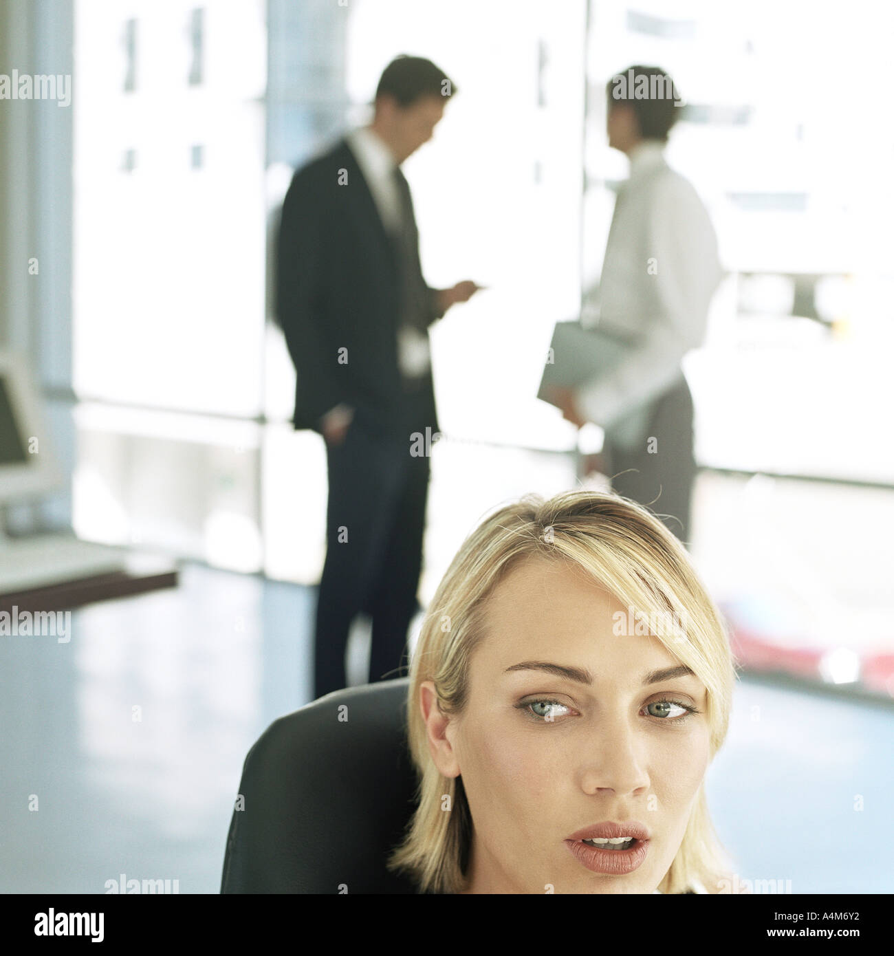 Office workers looking out window hi-res stock photography and images ...