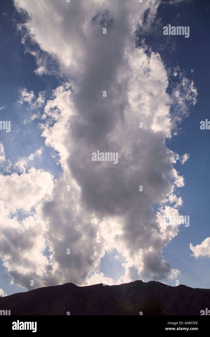 Threatening cloud formation over mountain range Stock Photo - Alamy