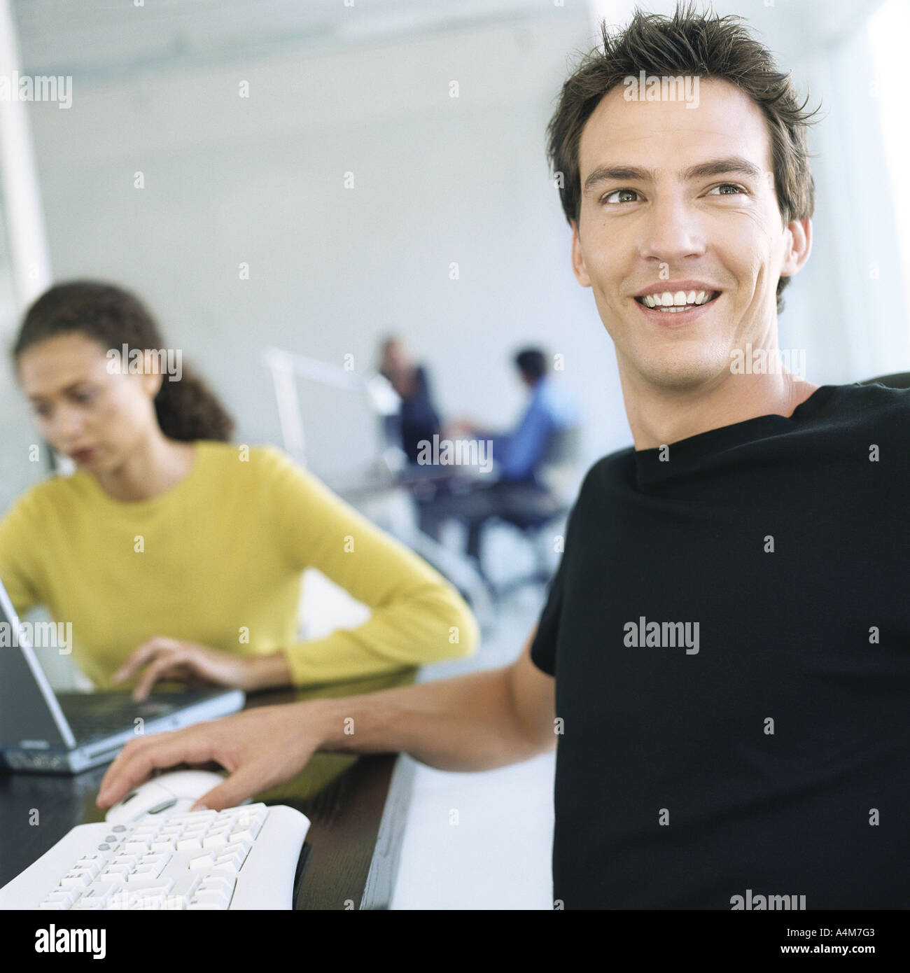 Minority worker at laptop keyboard hi-res stock photography and images ...