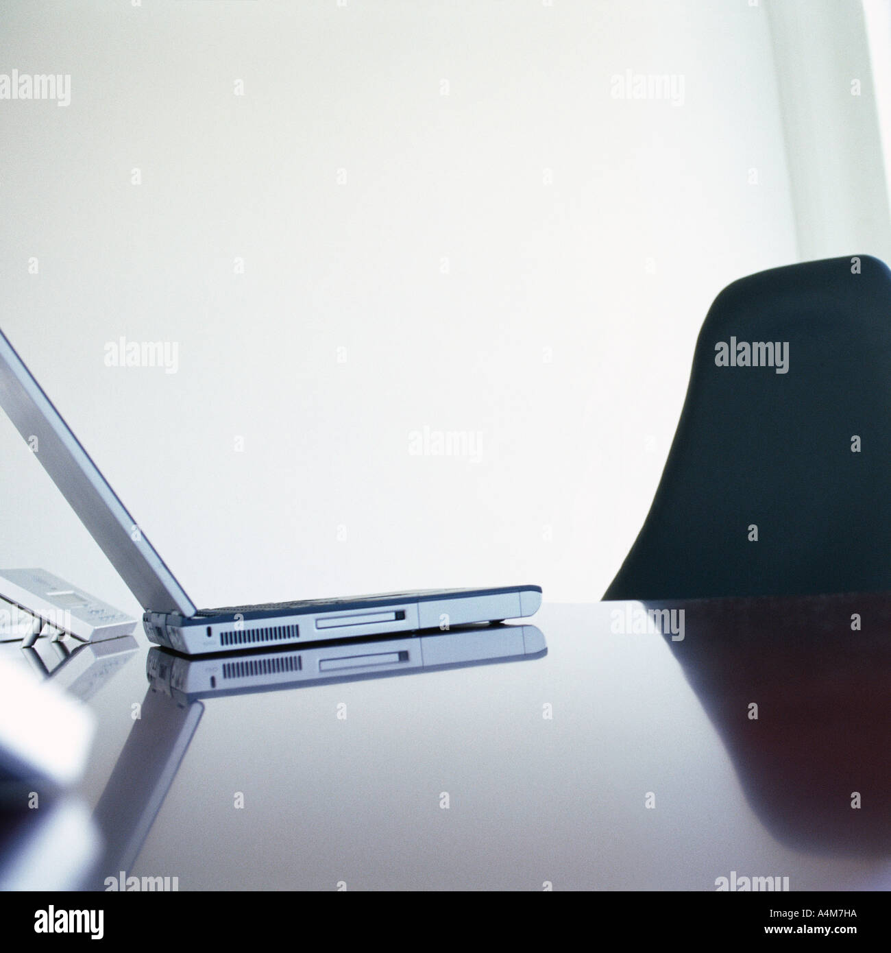 Laptop computer on desk Stock Photo - Alamy