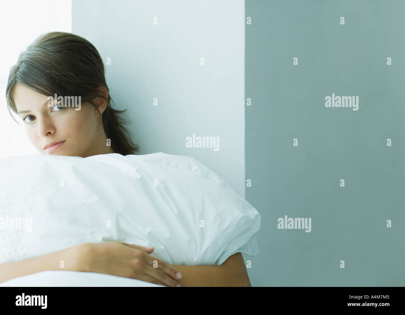 Squeezing pillow hi-res stock photography and images - Alamy