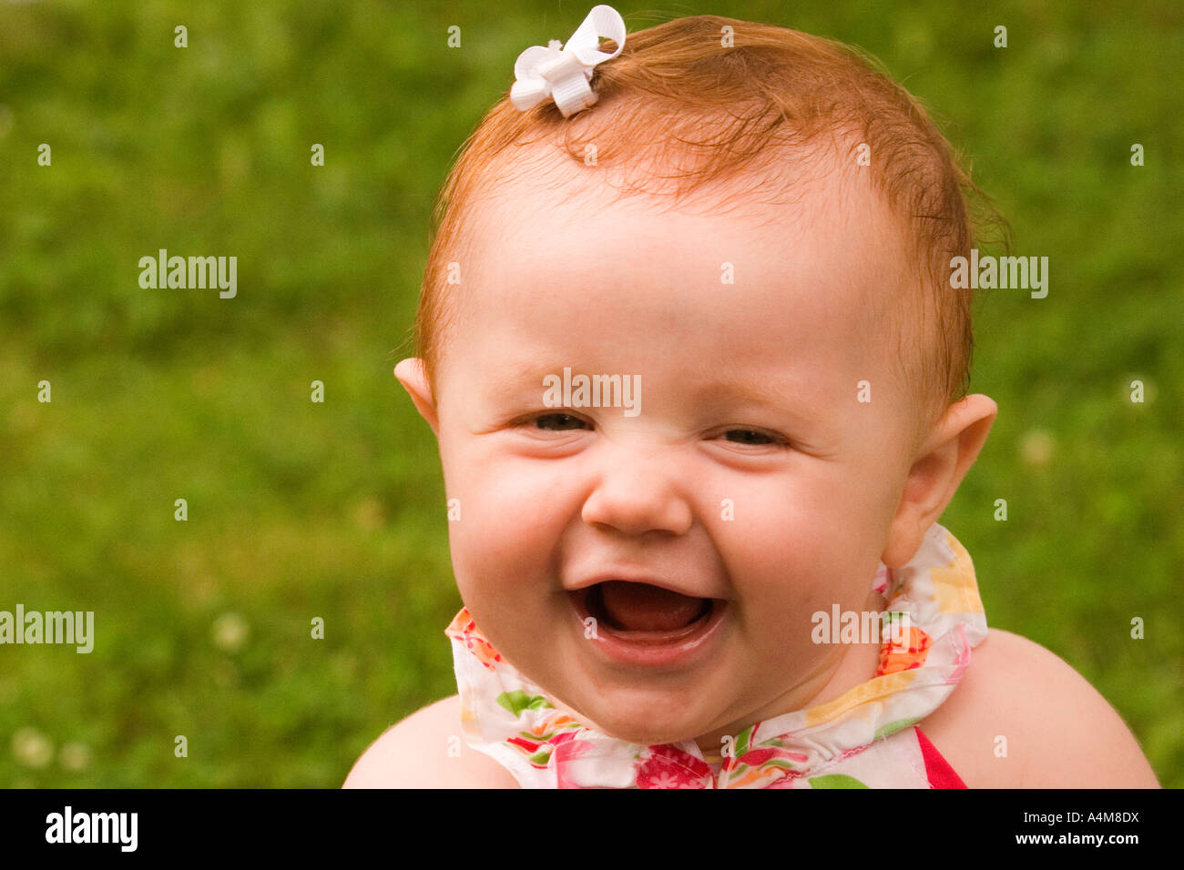 Closeup of a laughing red headed toddler Stock Photo - Alamy