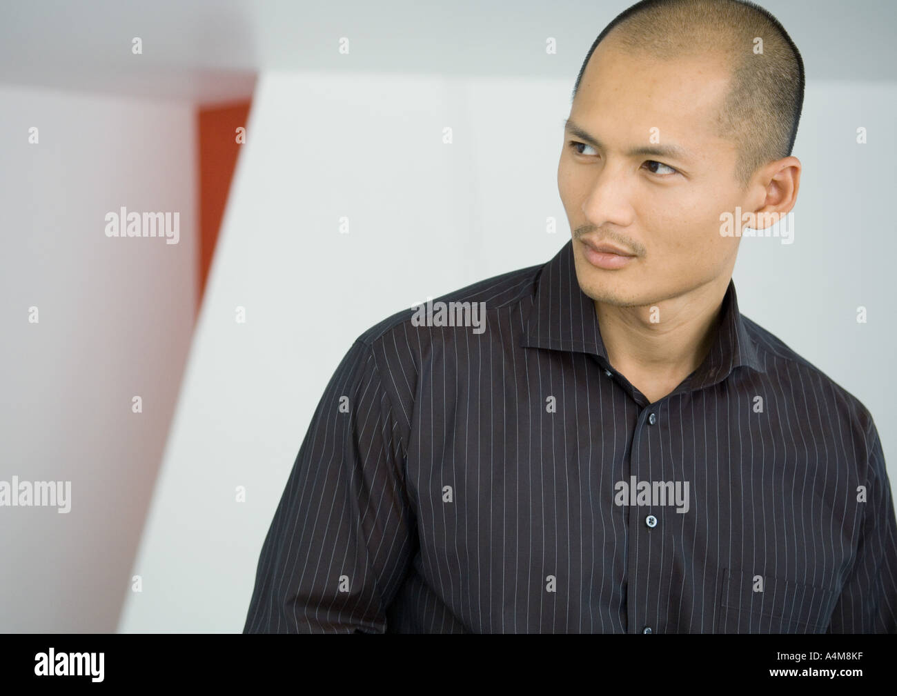 Man wearing button down shirt, portrait Stock Photo - Alamy