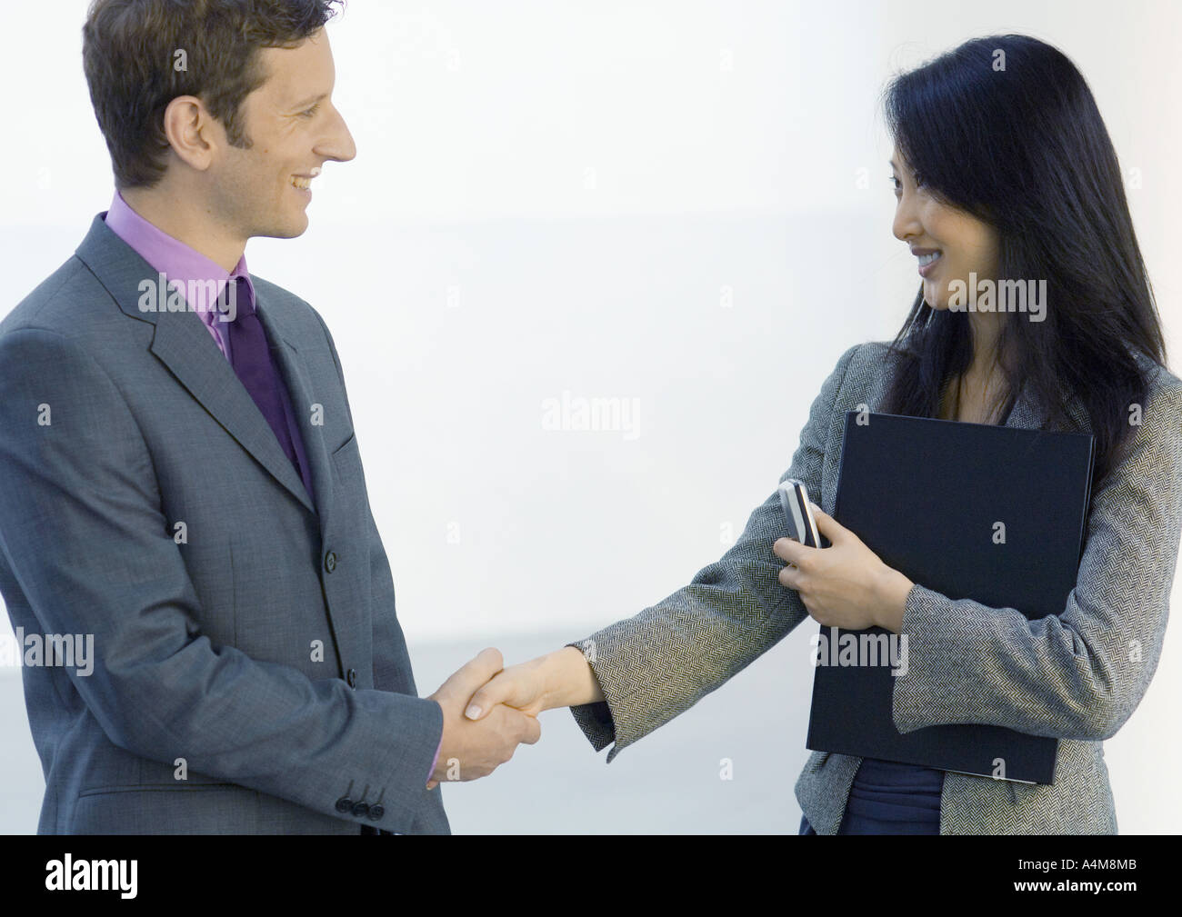 Minority handshake hi-res stock photography and images - Alamy