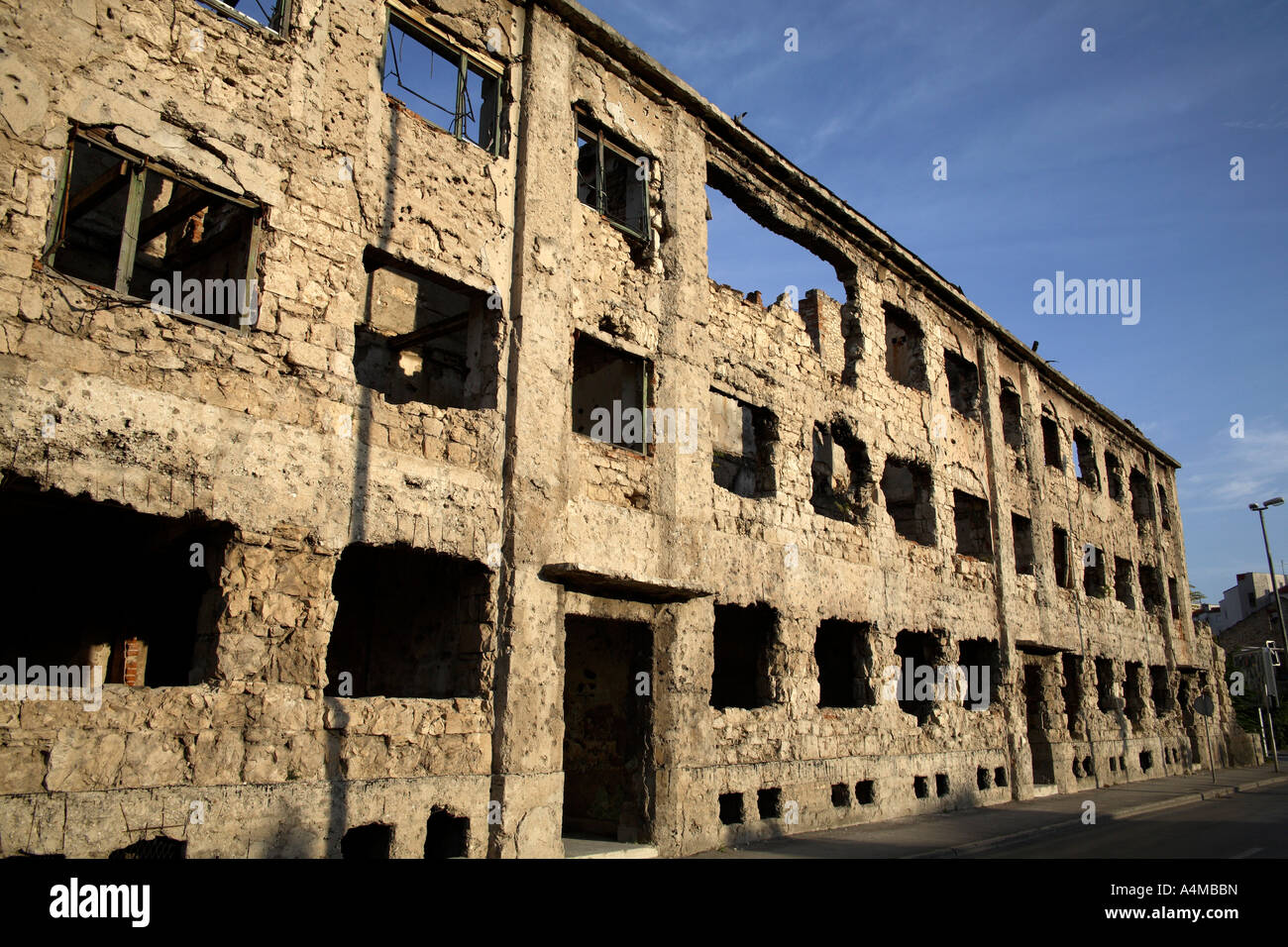Building covered in damage from gunfire and shelling from Yugoslavian ...