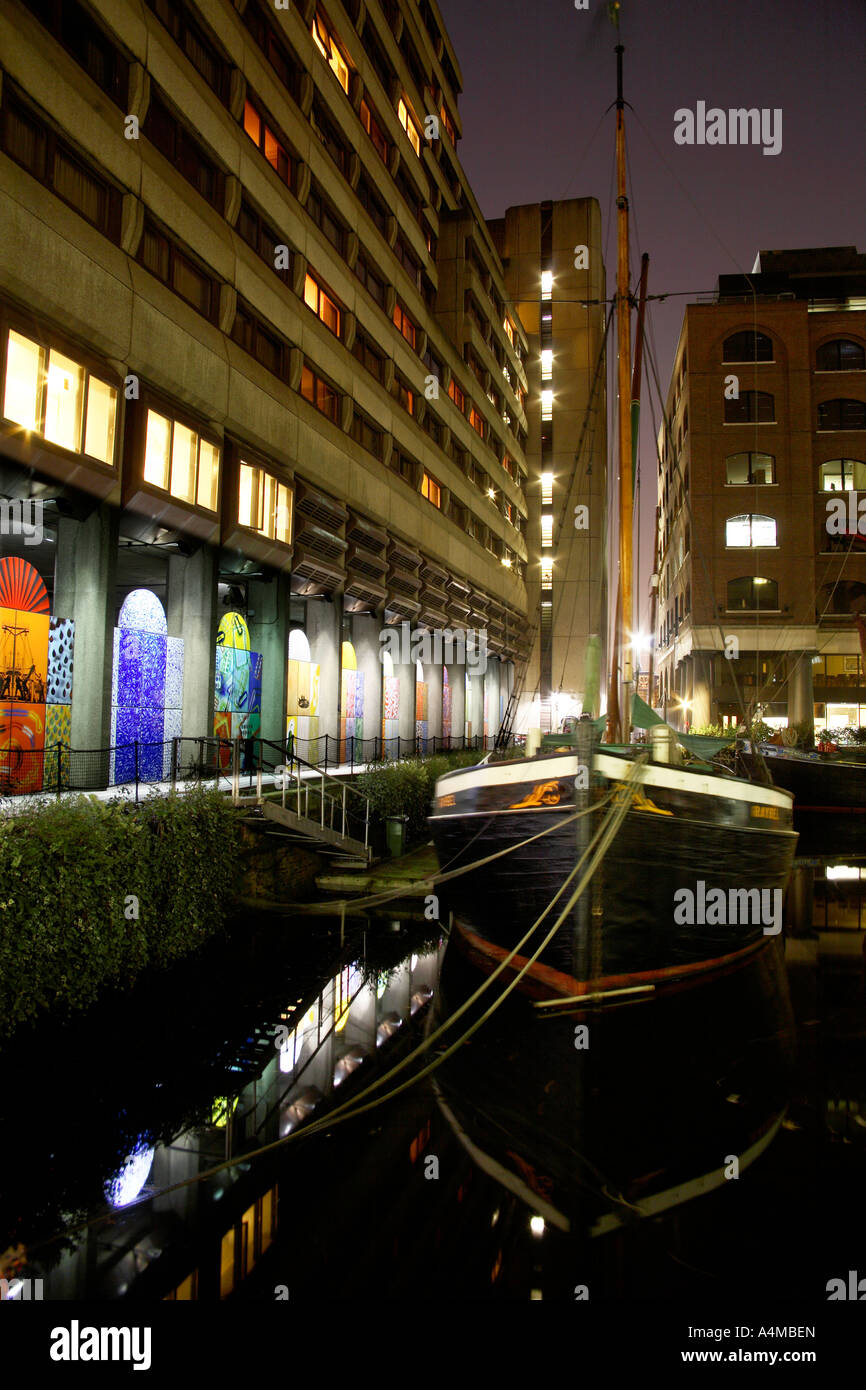Boat moored in St Katherine's Docks at twilight. Tower Hamlets, London ...