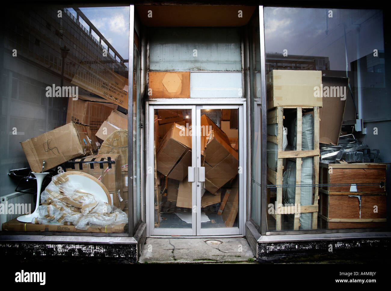 Empty shop front filled with cardboard boxes. Euston Centre, Euston ...