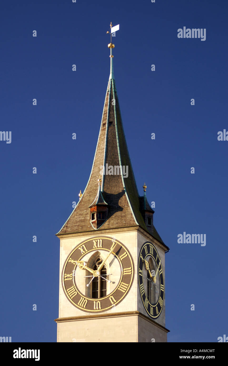 The clock tower and steeple of St Peter's church in Zürich Switzerland ...